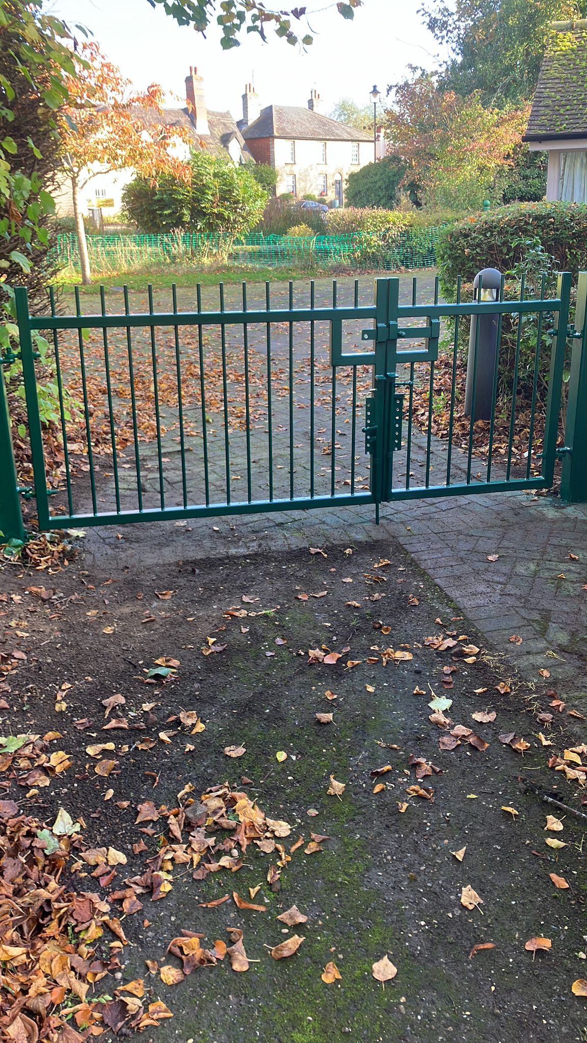 Green Vertical Bar Gates Installation in Essex by Almec Fencing | Almec ...