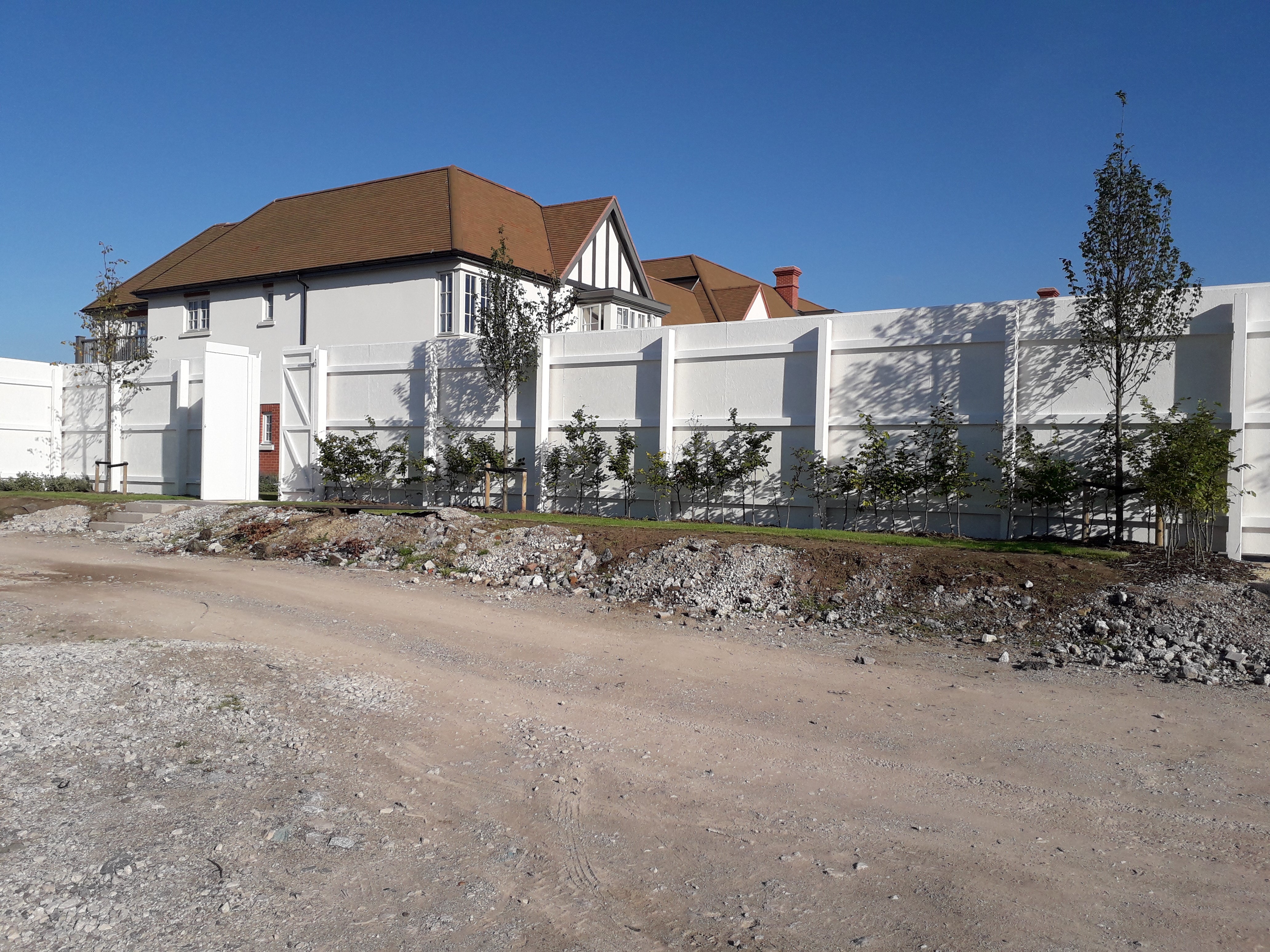 Painted White Timber Hoarding Installed in Tattenhall in Cheshire ...